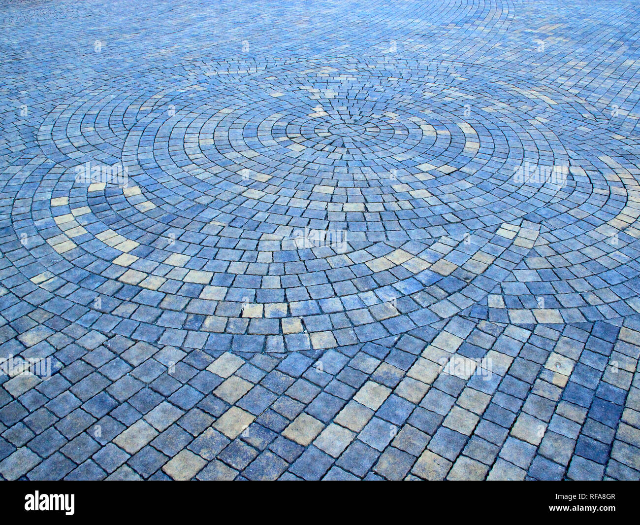 Cobblestone bridge made from figured stones on city road. Stony texture ...