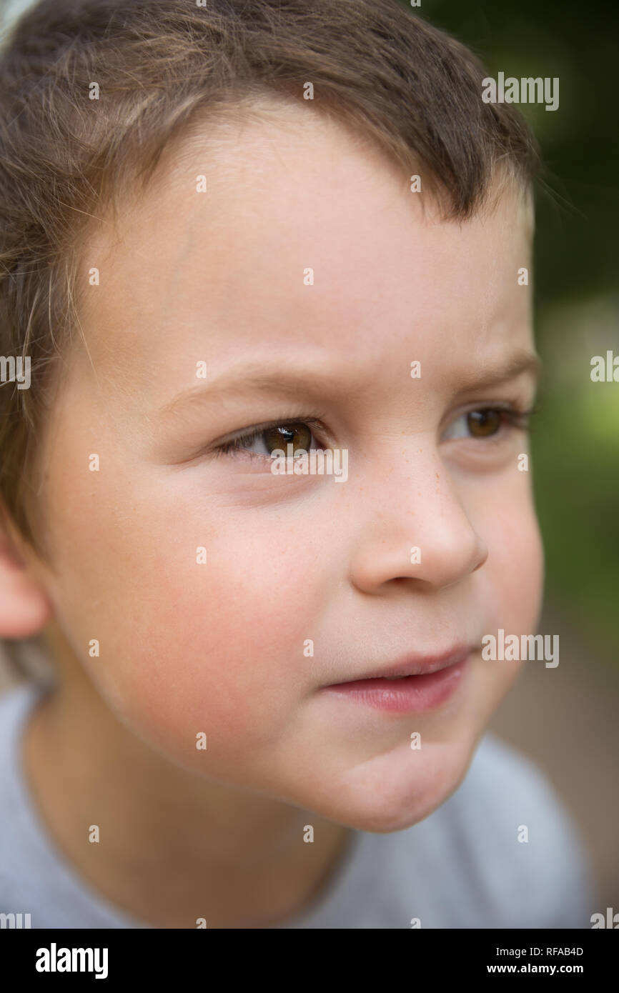 Boy With Brown Hair And Blue Eyes