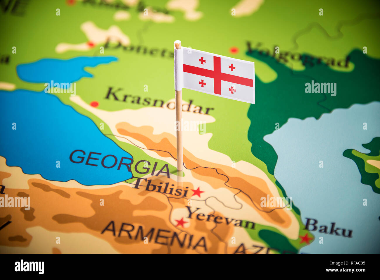 Georgia marked with a flag on the map Stock Photo - Alamy