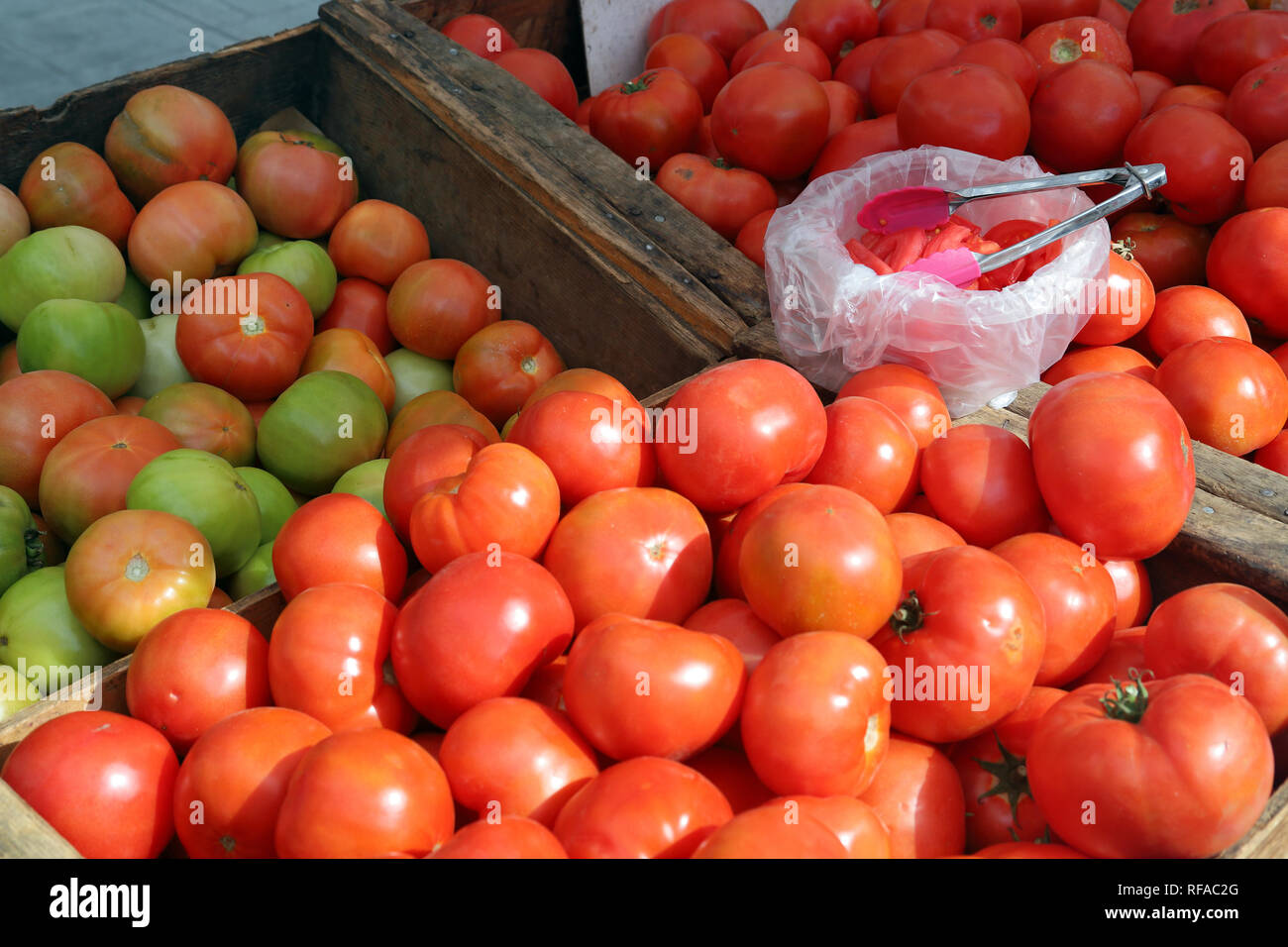 Fresh colorful tomotoes at open market Stock Photo - Alamy