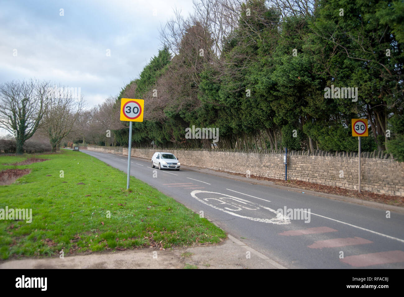 Traffic in a rural English Village Stock Photo - Alamy
