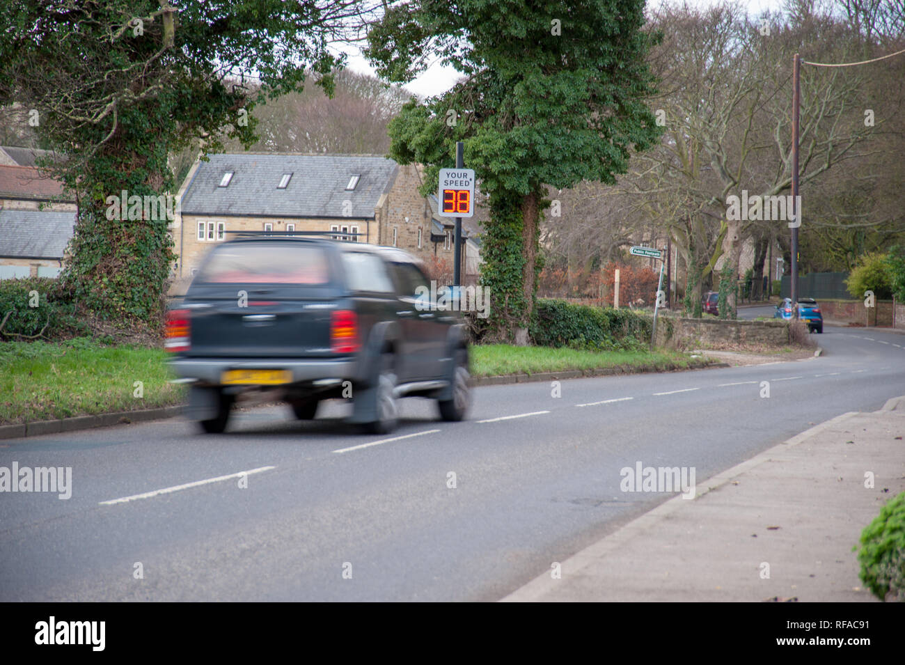 Traffic in a rural English Village Stock Photo - Alamy