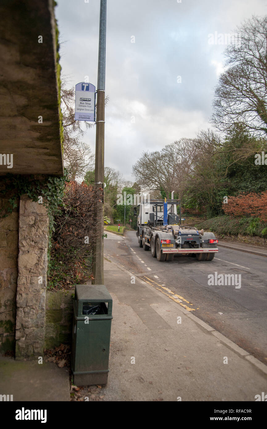 UK road scenes featuring a bus, lorry, and cars navigating winding ...