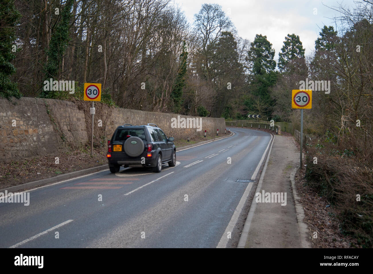 UK road scenes featuring a bus, lorry, and cars navigating winding ...