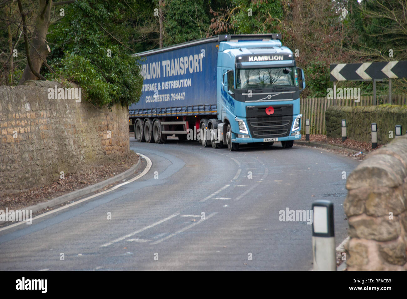UK road scenes featuring a bus, lorry, and cars navigating winding ...