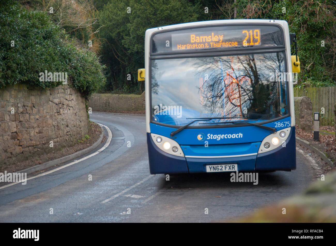 UK road scenes featuring a bus, lorry, and cars navigating winding ...