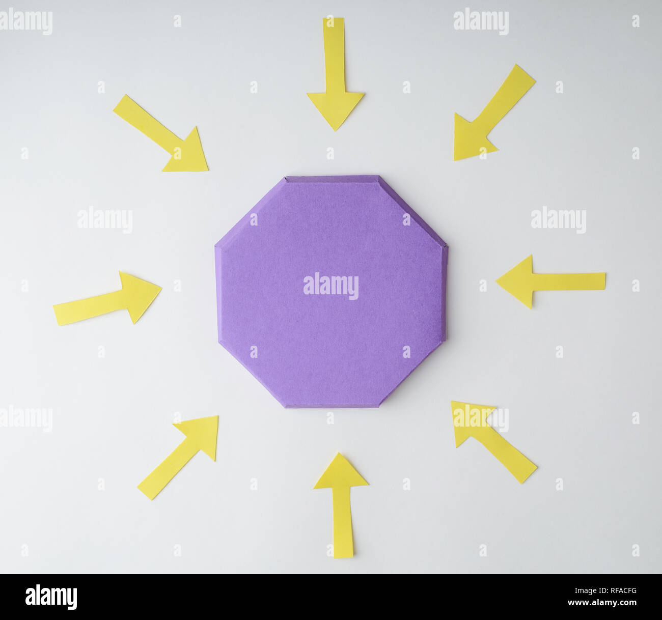 Octagon surrounded with arrows Stock Photo - Alamy