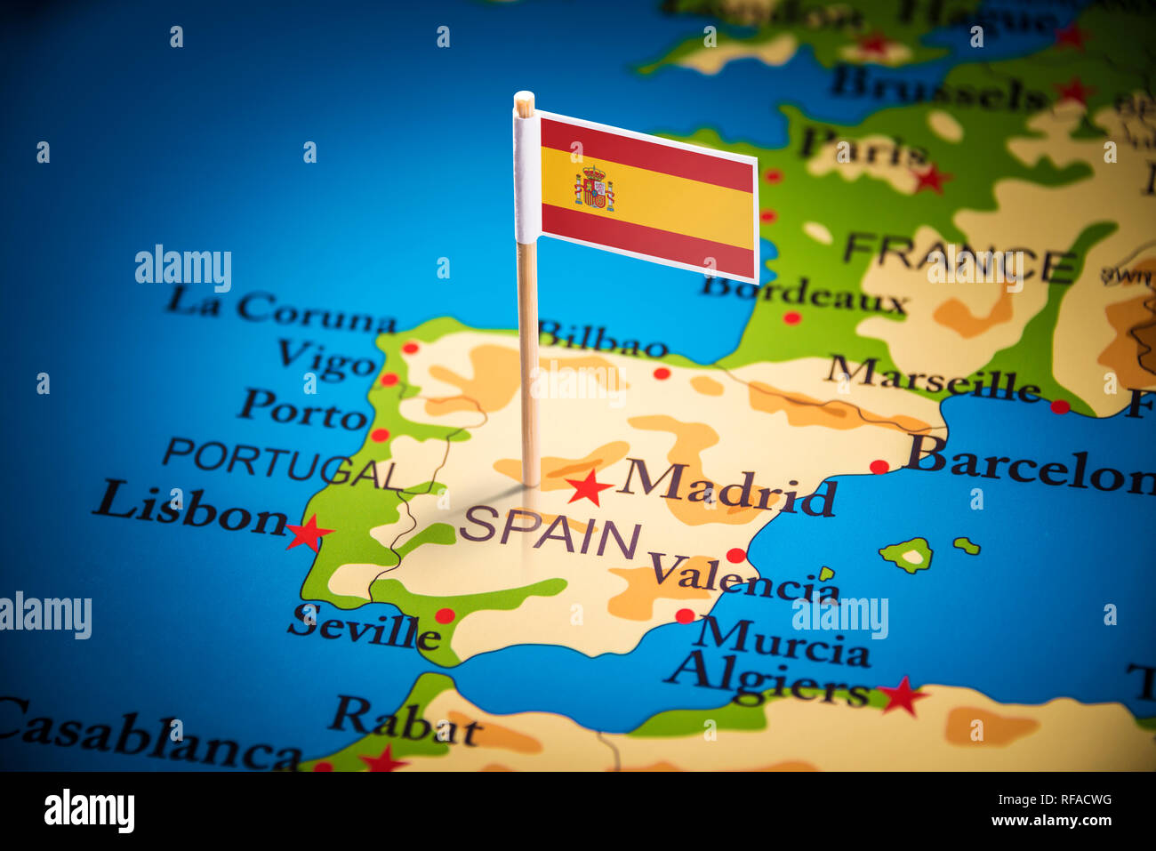 spain marked with a flag on the map Stock Photo - Alamy