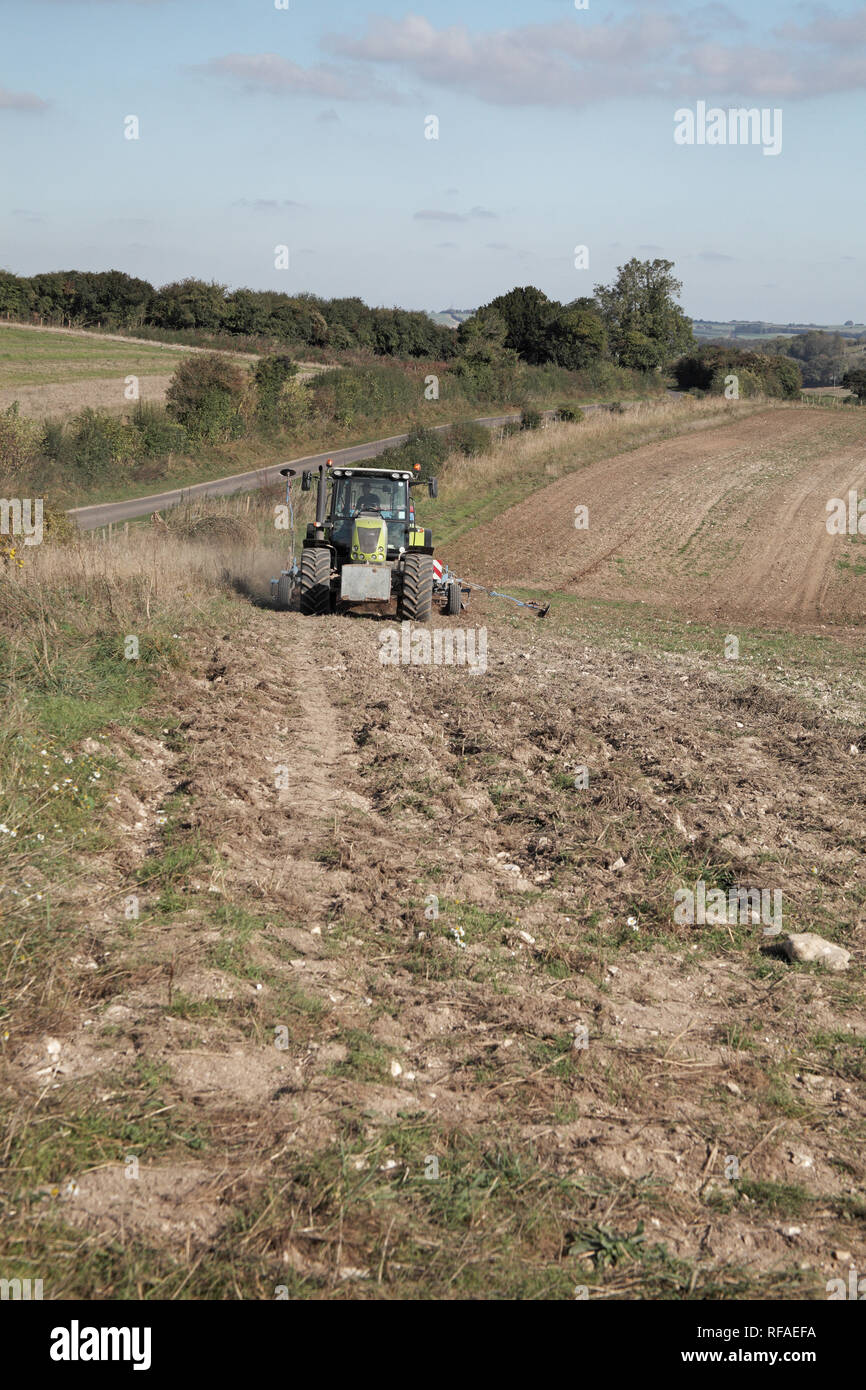 Farmer drilling winter wheat Tidpit near Martin Hampshire England UK ...