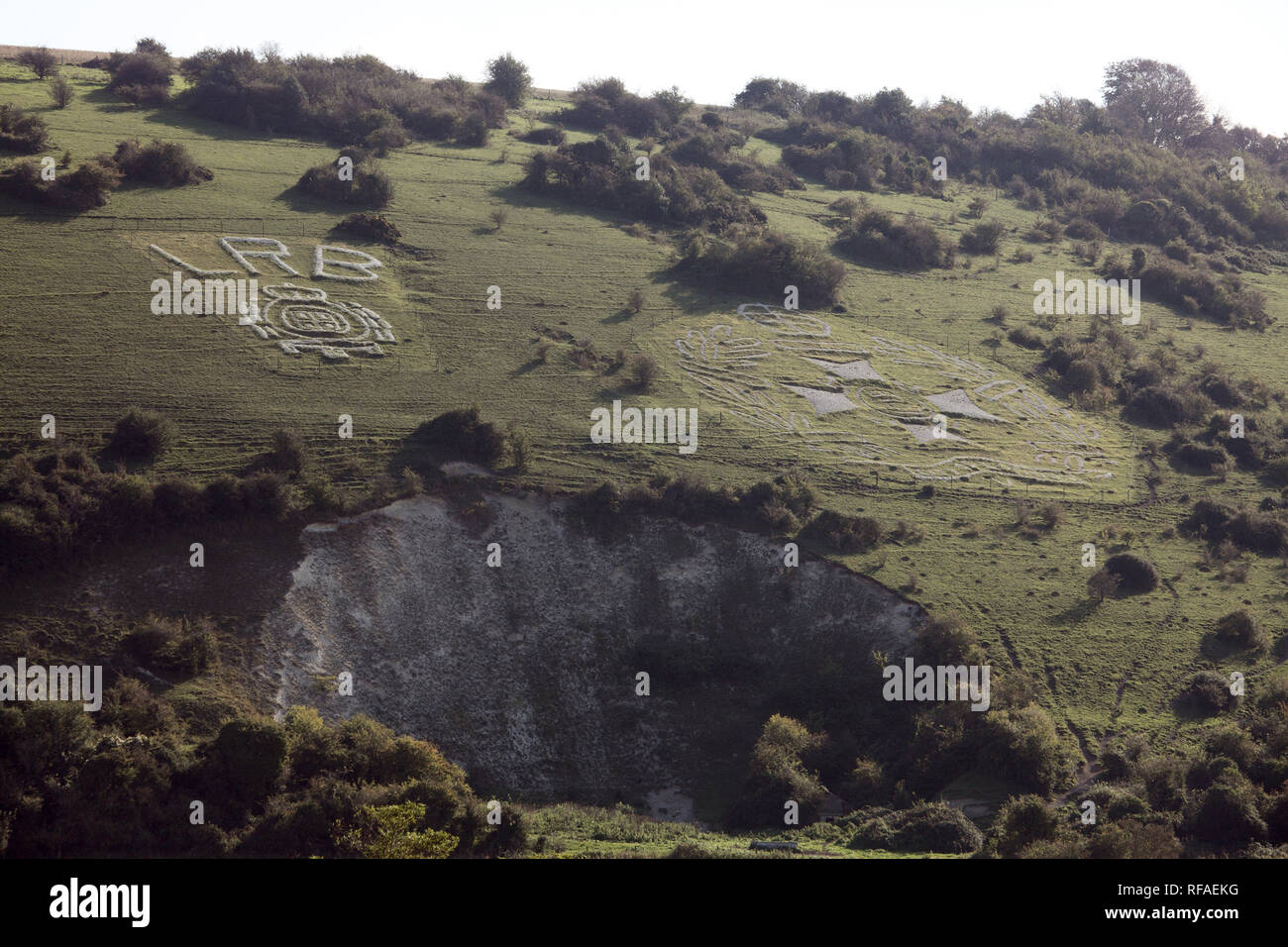 London Rifle Brigade and Post Office Rifles military badges in chalk on ...