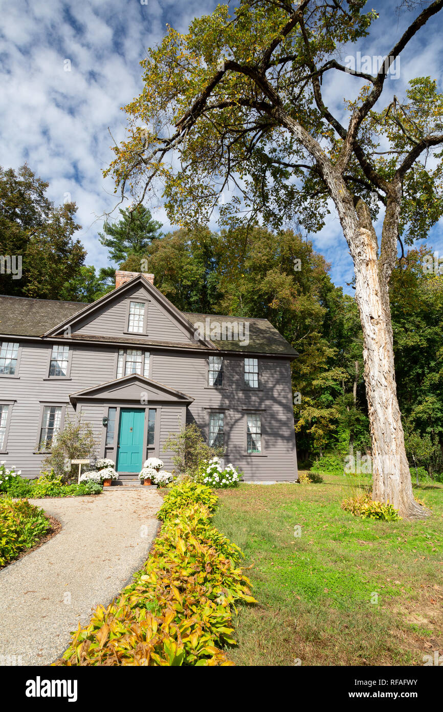 A large tree arching above the historic Orchard House. Minute Man ...
