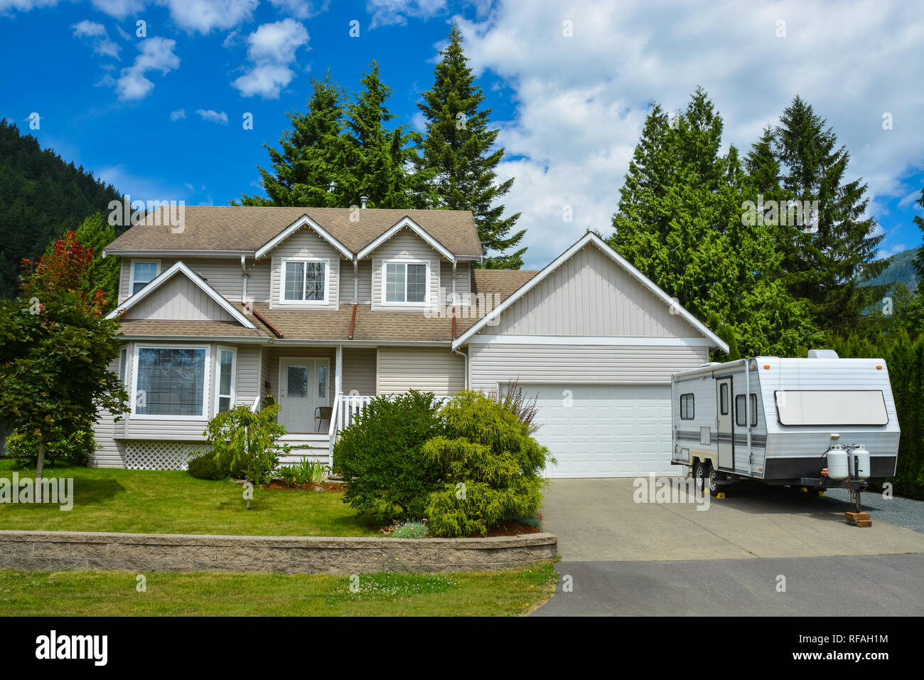 Big family house on country side with RV trailer parked on driveway ...