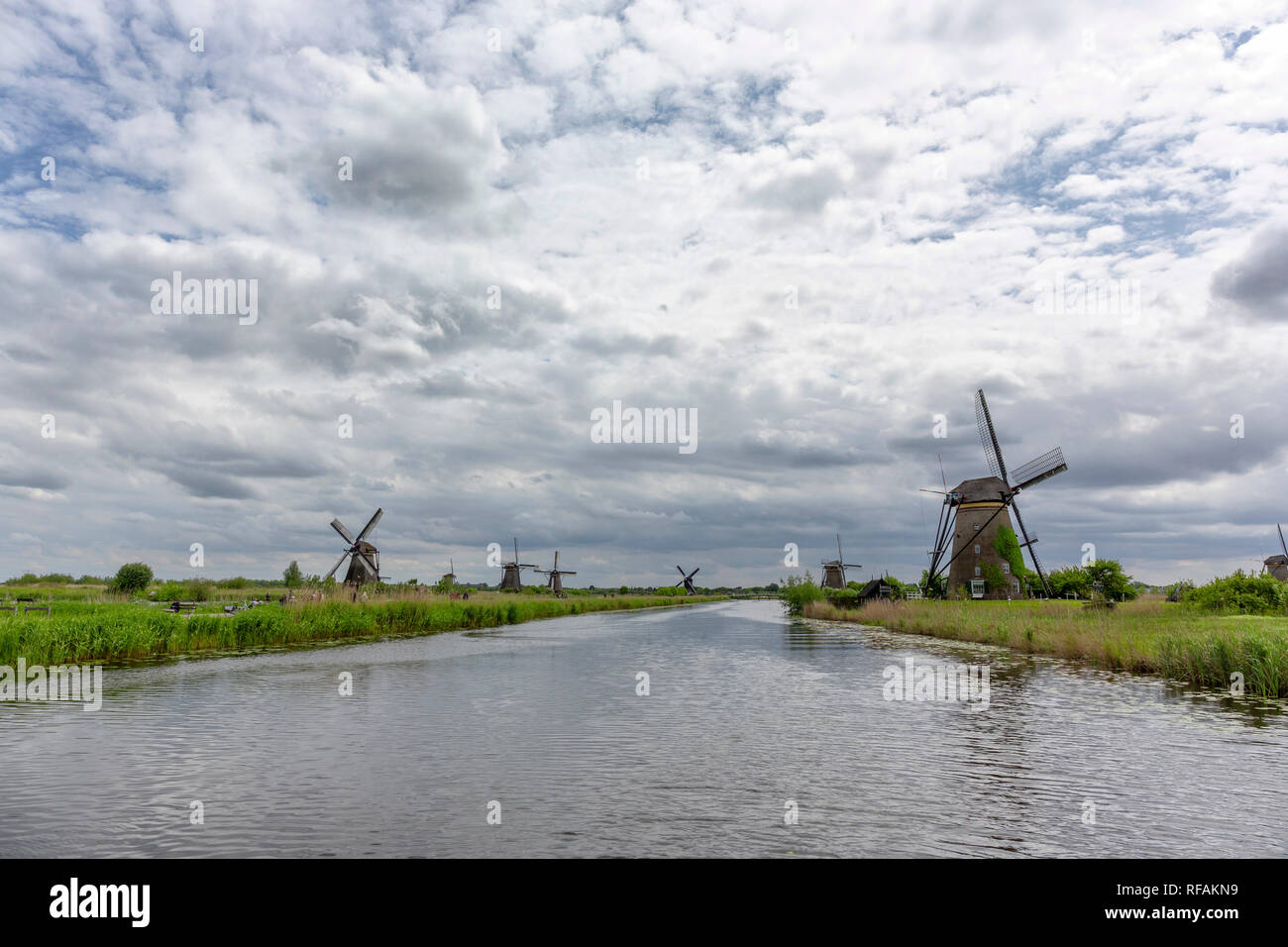 Famous Dutch wooden windmills in Kinderdijk Holland. Sunny summer ...
