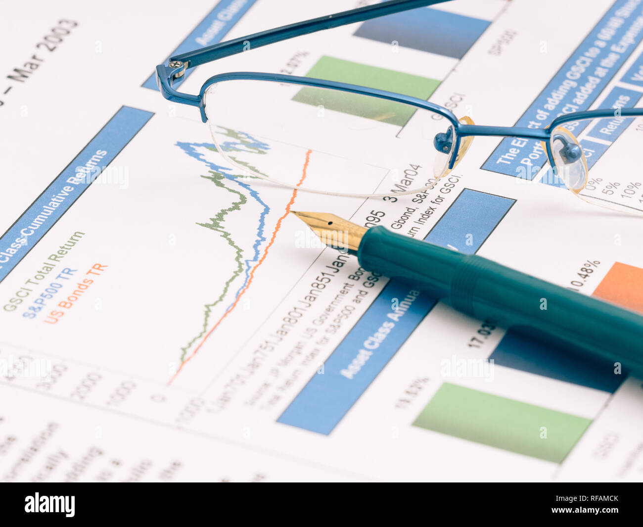 Business presentation with finance chart on the desk Stock Photo - Alamy