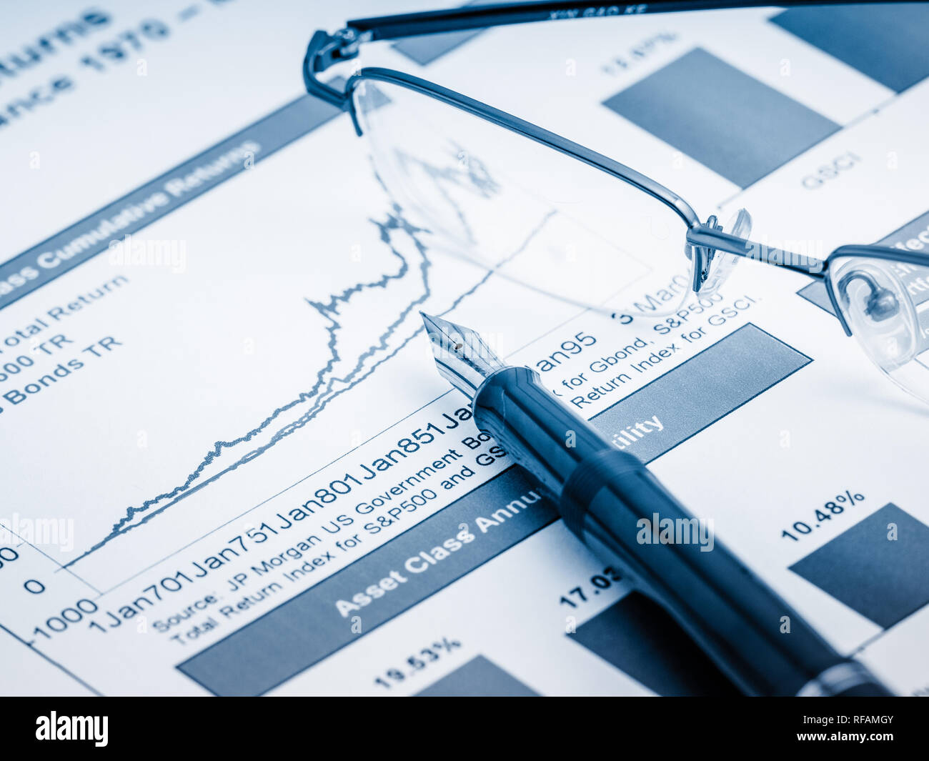 Business presentation with finance chart on the desk Stock Photo - Alamy