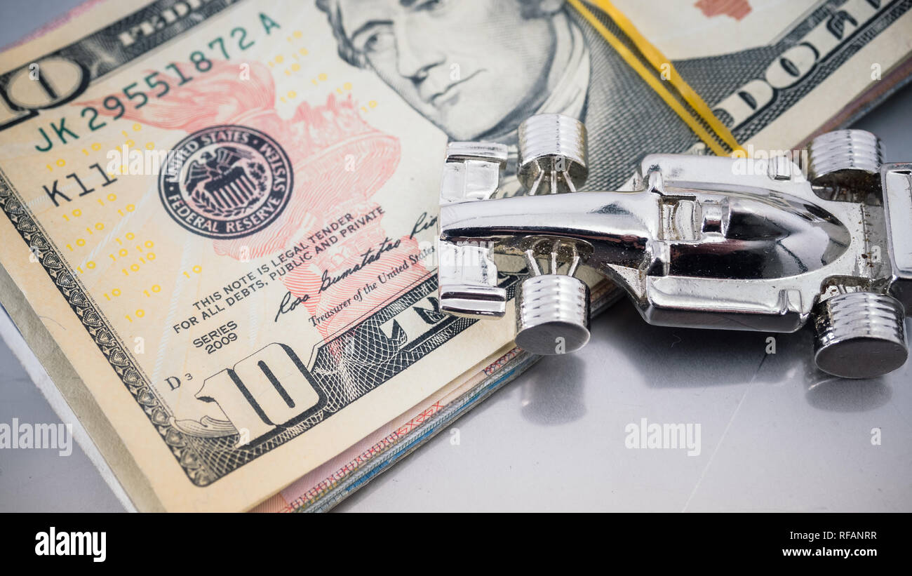 formula car on the money Stock Photo - Alamy