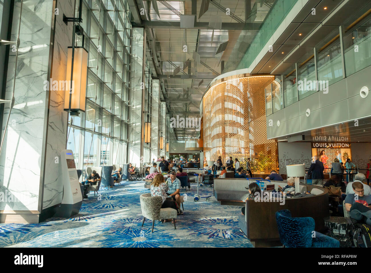 Singapore - January 2019: Singapore Changi Airport architecture and passengers. Singapore ...