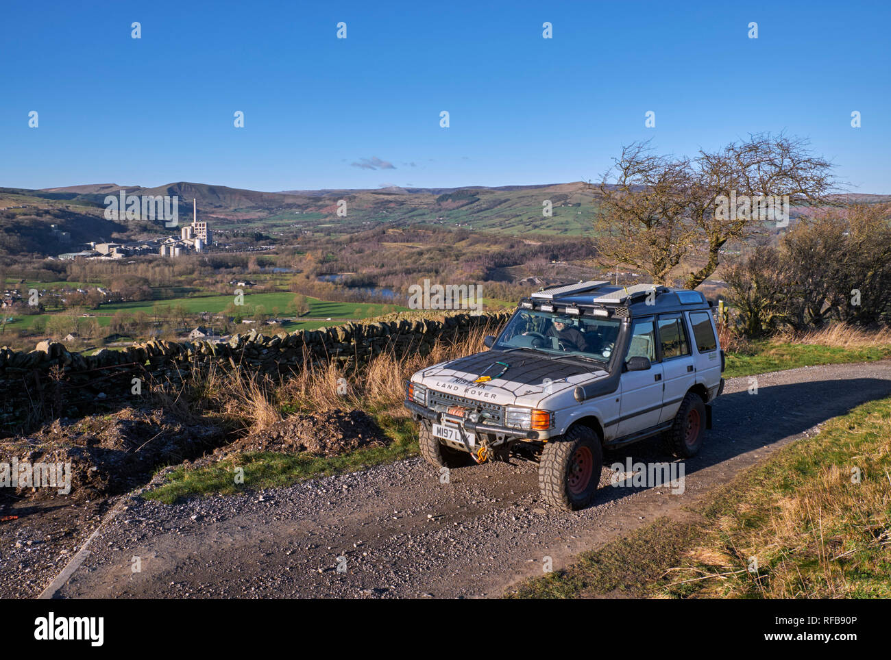 Land Rover on a Green Lane with Breedon Hope Cement Works in distance ...