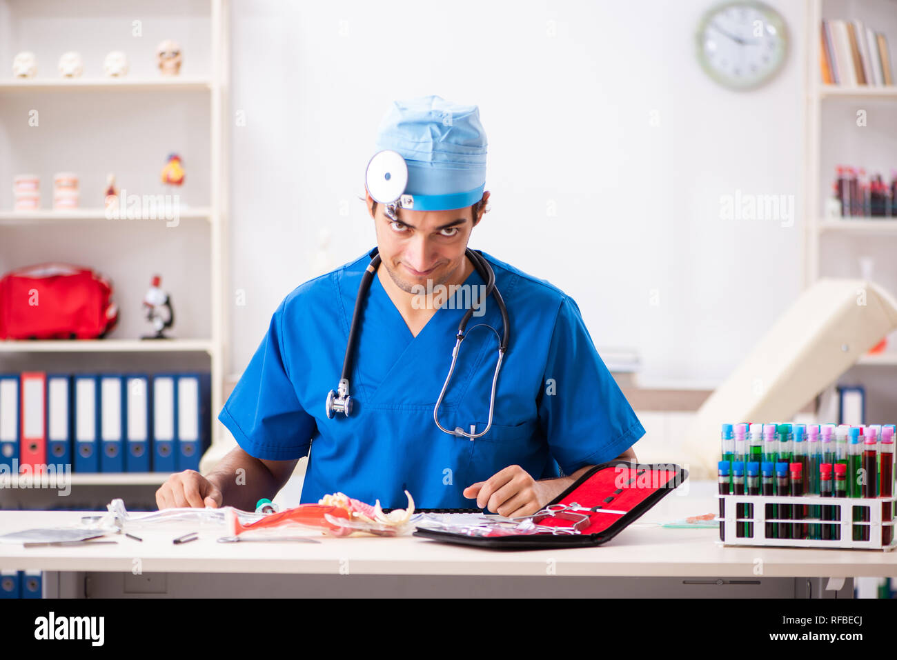 Mad doctor working in the clinic Stock Photo - Alamy