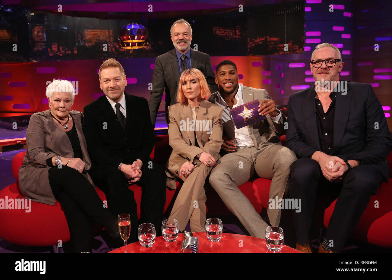 Host Graham Norton with (seated left to right) Dame Judi Dench, Sir ...