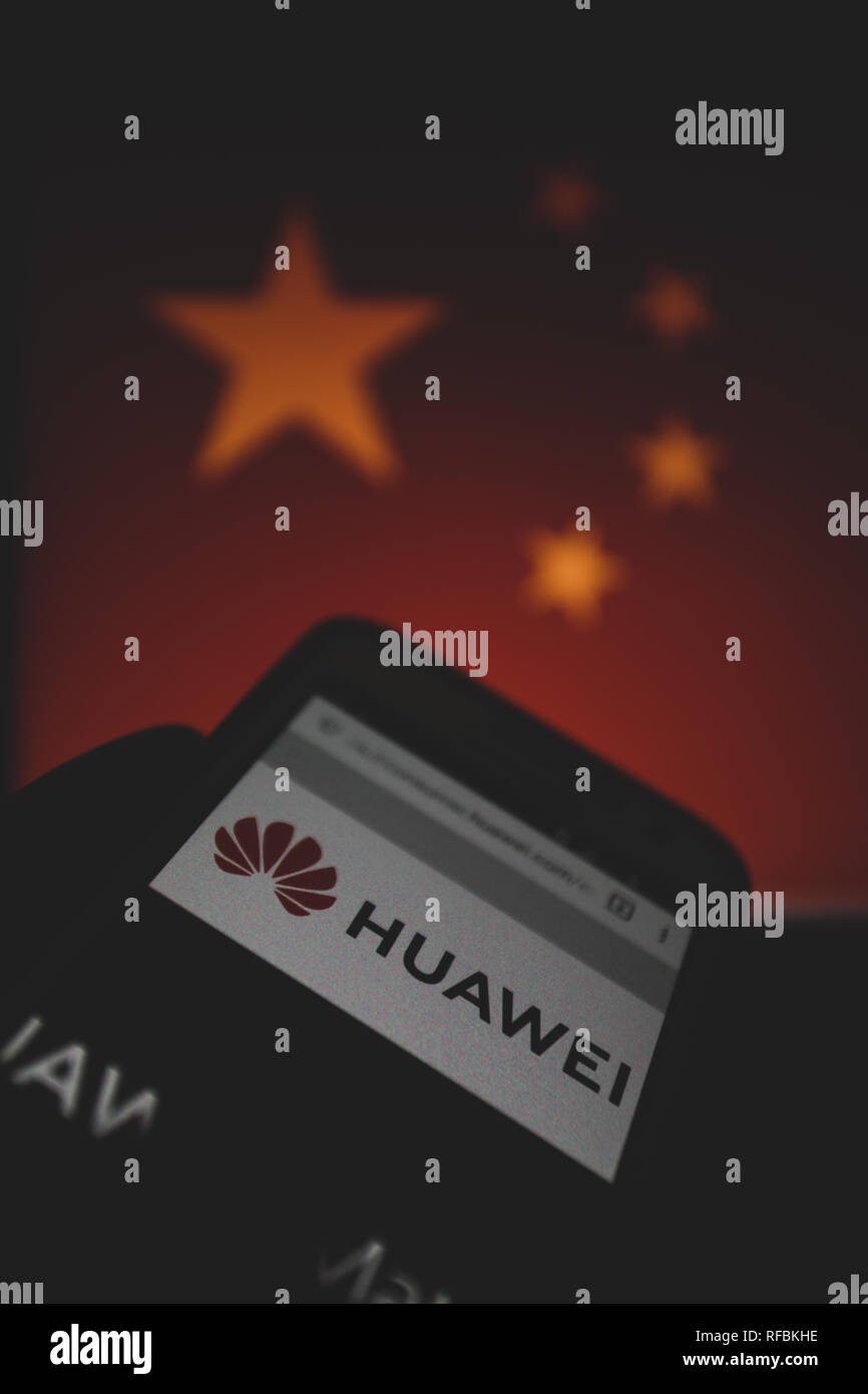Huawei logo on its website is shown on a smartphone display, People's ...