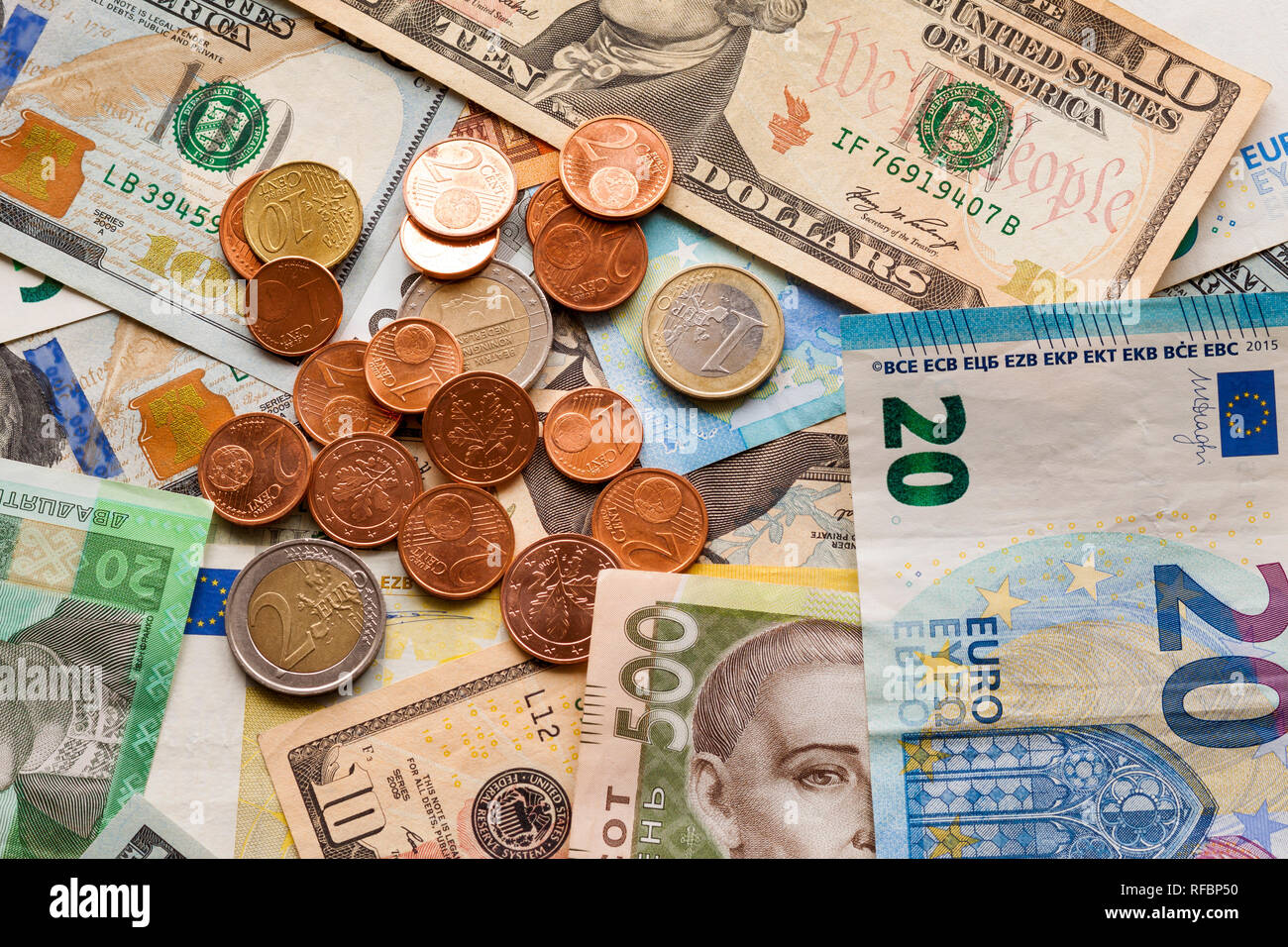 Colorful abstract background made of different metal coins, American ...