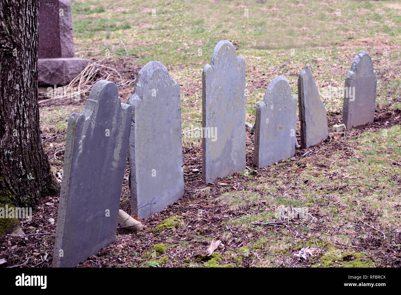 Row of old family cemetery headstones Stock Photo - Alamy