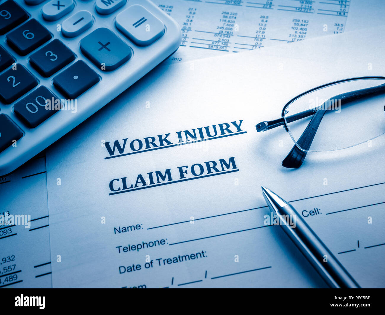work injury claim form Stock Photo - Alamy