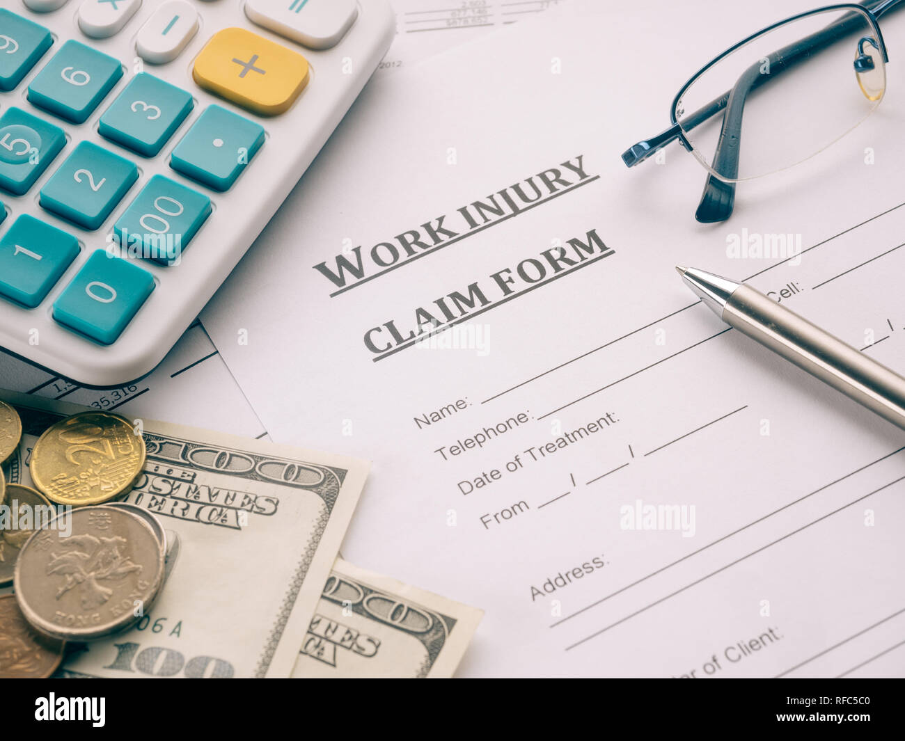 work injury claim form Stock Photo - Alamy