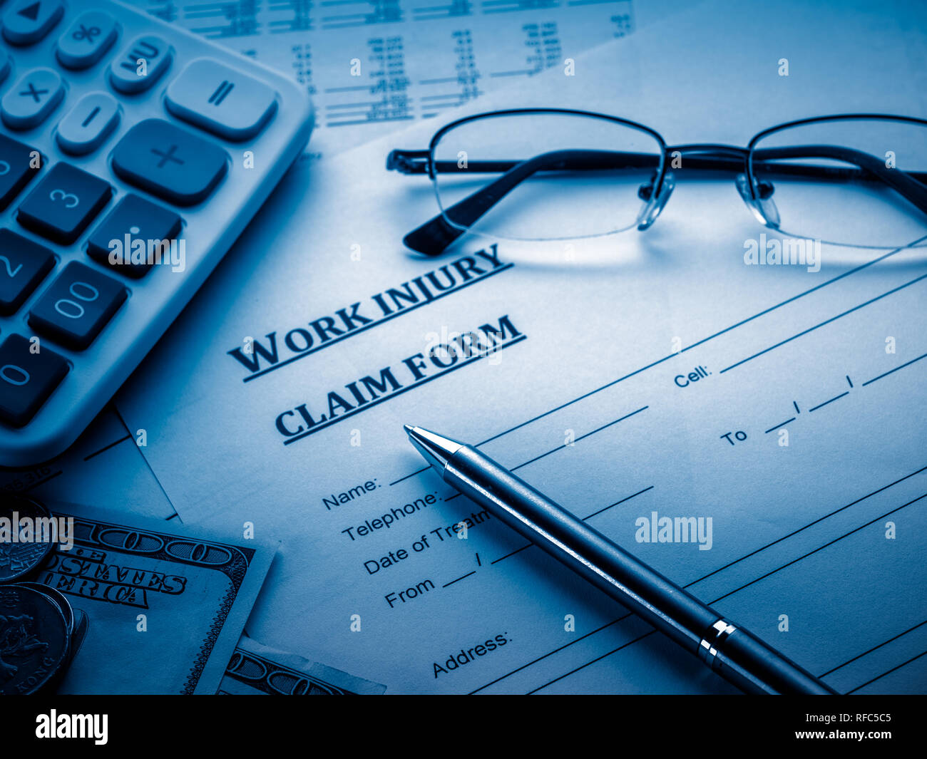 work injury claim form Stock Photo - Alamy