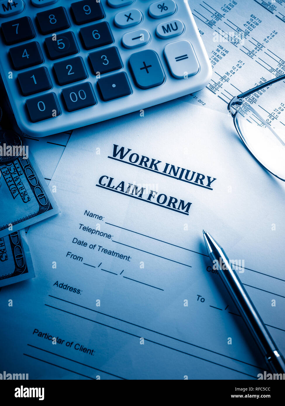 work injury claim form Stock Photo - Alamy