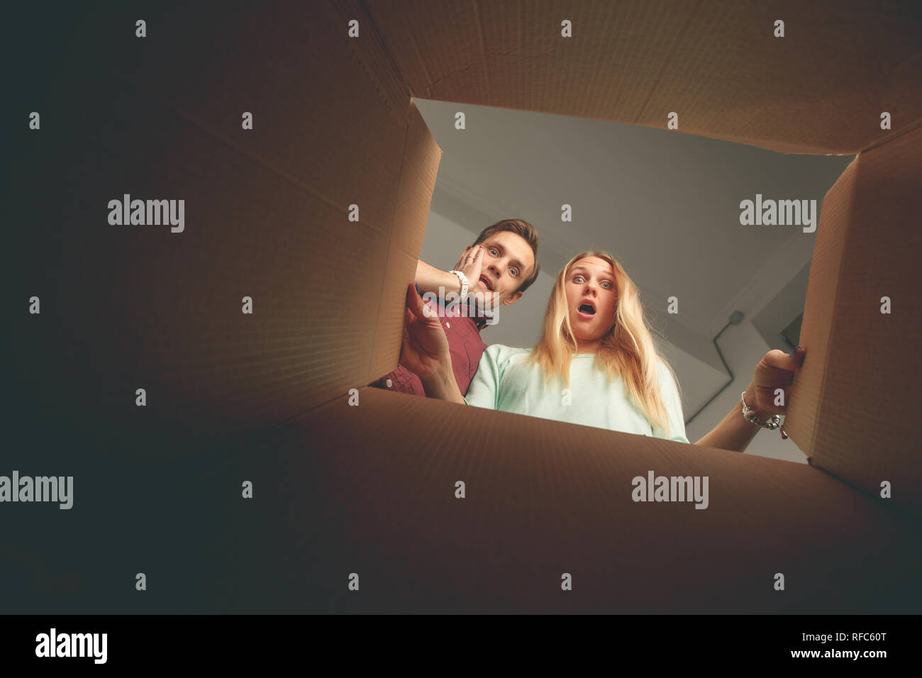 Beautiful girl inside cardboard box hi-res stock photography and images ...