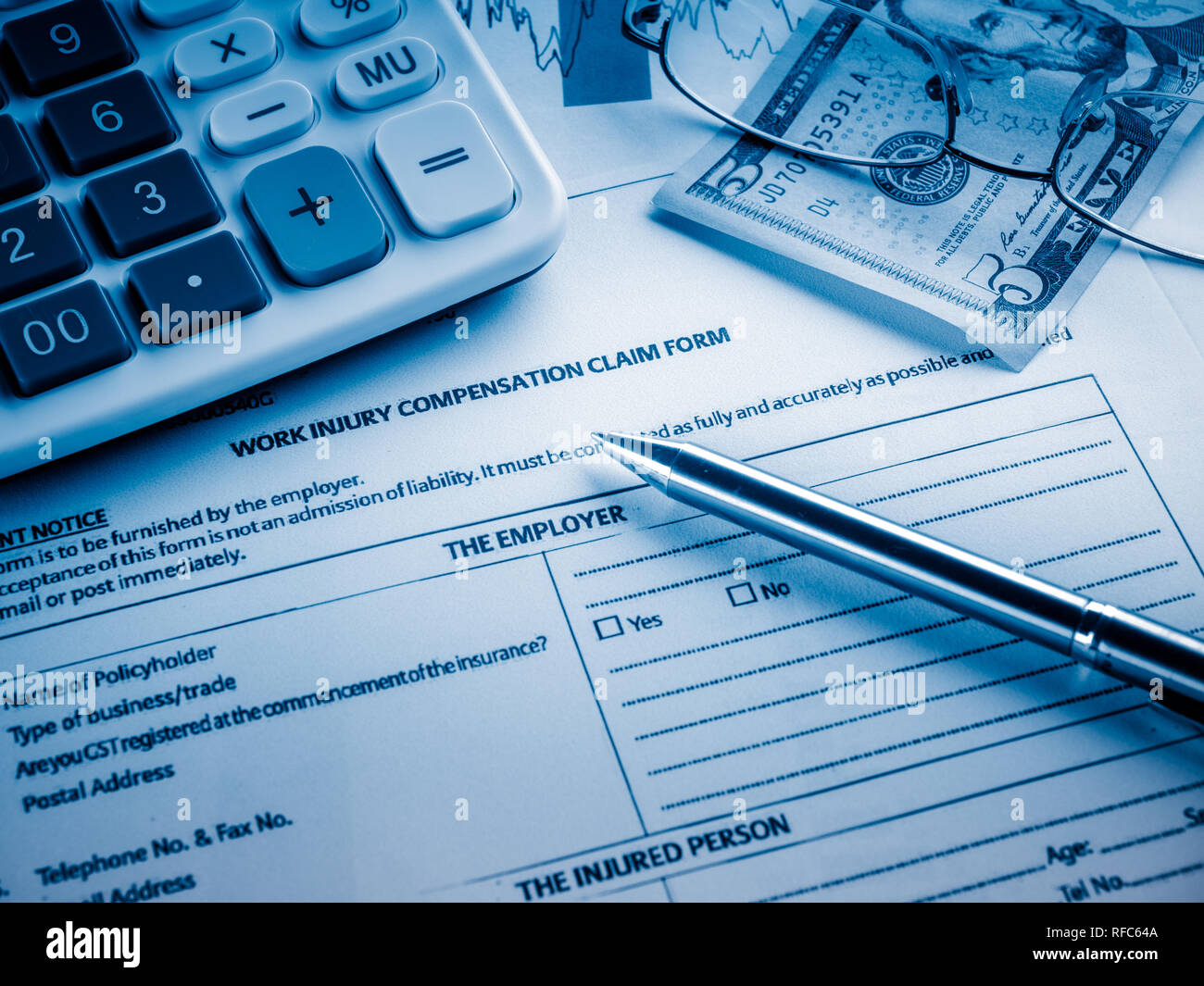 work injury compensation claim form Stock Photo - Alamy