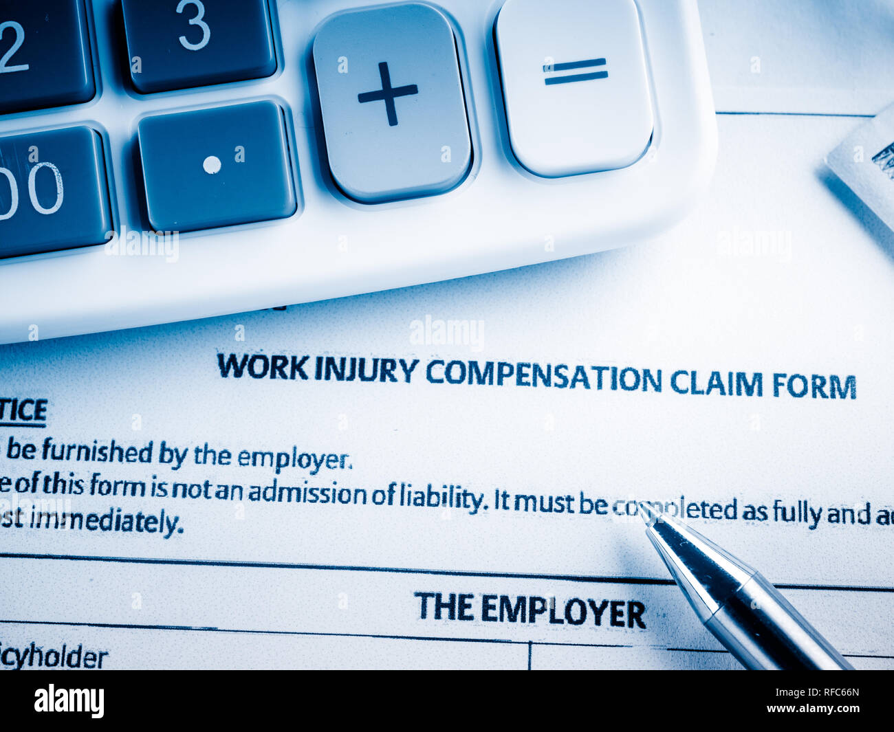 work injury compensation claim form Stock Photo - Alamy