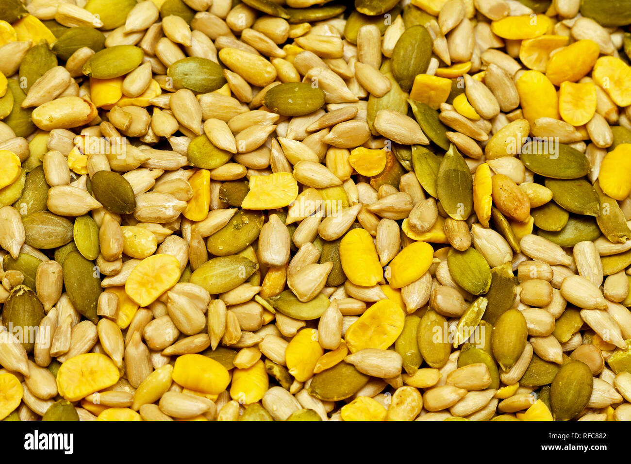 Big pile of healthy dried seeds mix Stock Photo - Alamy