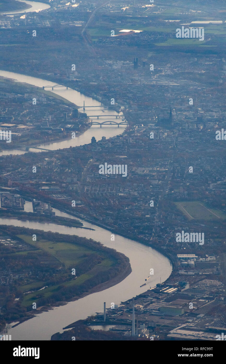 German city of Cologne seen from air with Rhine river, cathedral and ...