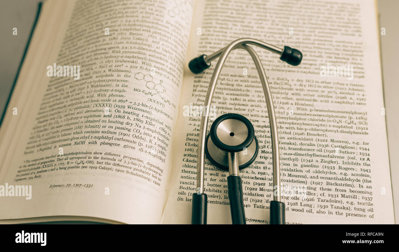 stethoscope and books on white background Stock Photo - Alamy