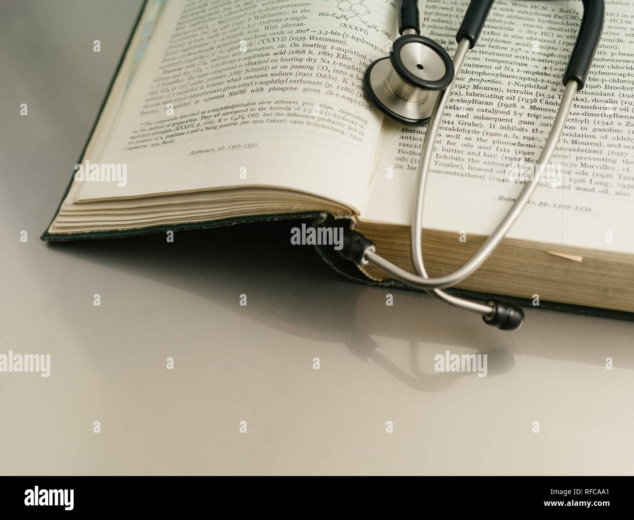 stethoscope and books on white background Stock Photo - Alamy