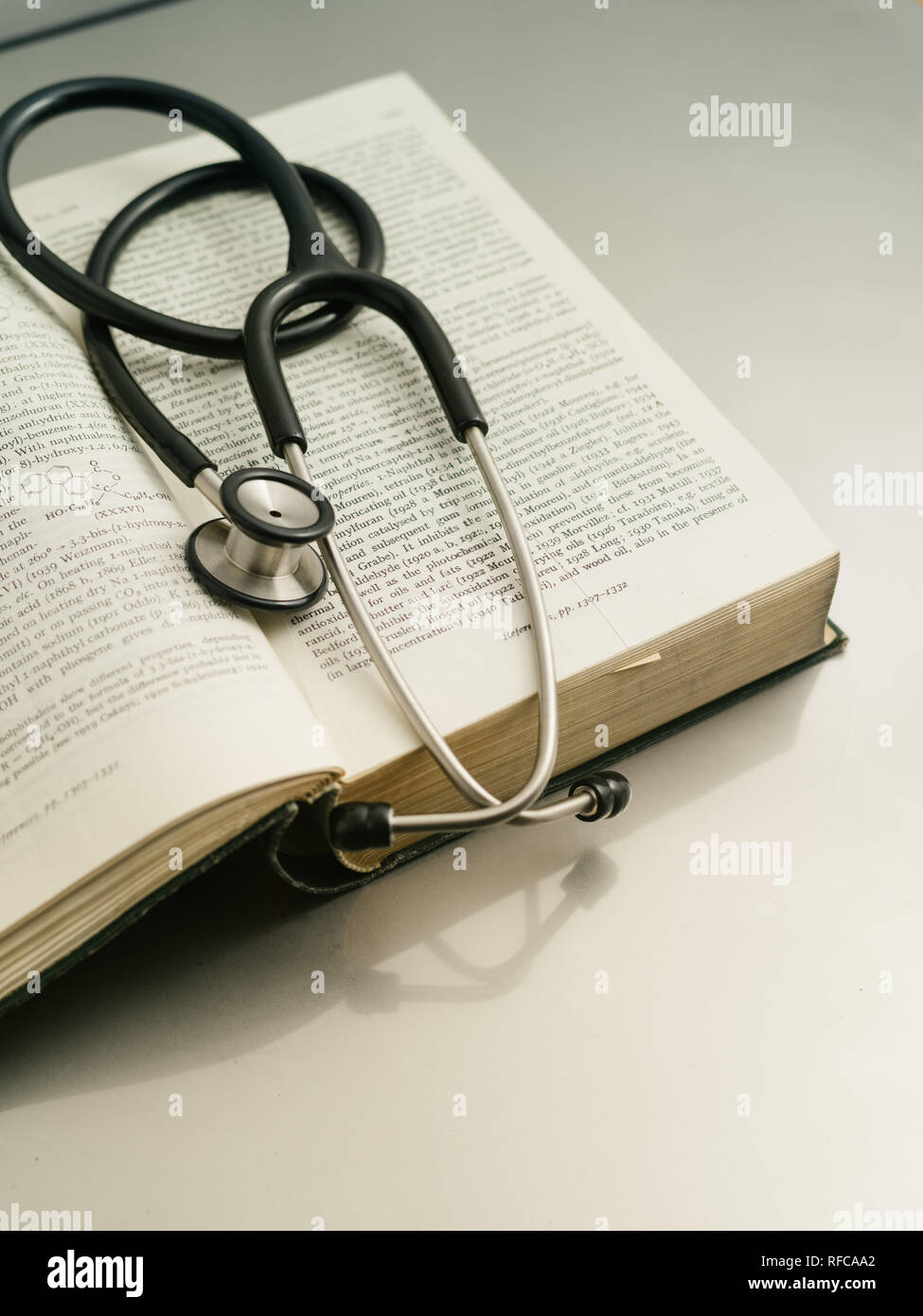 stethoscope and books on white background Stock Photo - Alamy