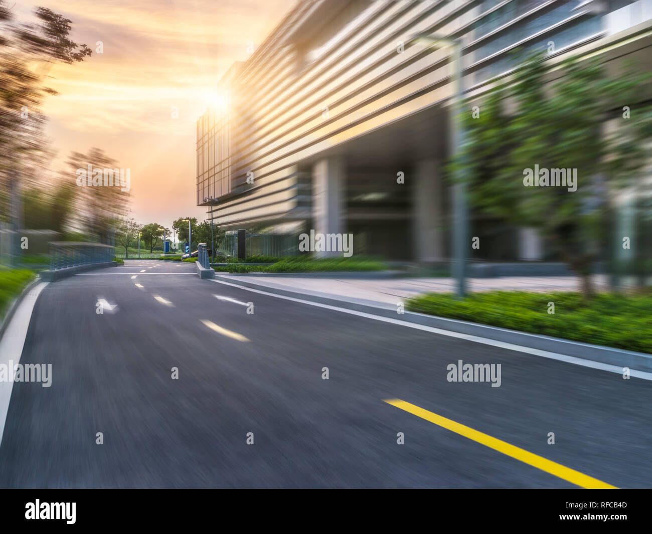 empty asphalt road by modern office building Stock Photo - Alamy