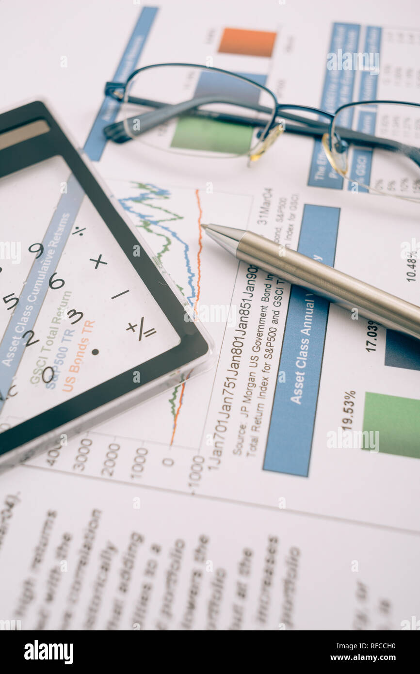Business presentation with finance chart on the desk Stock Photo - Alamy
