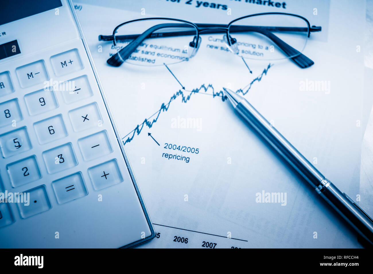 Business presentation with finance chart on the desk Stock Photo - Alamy
