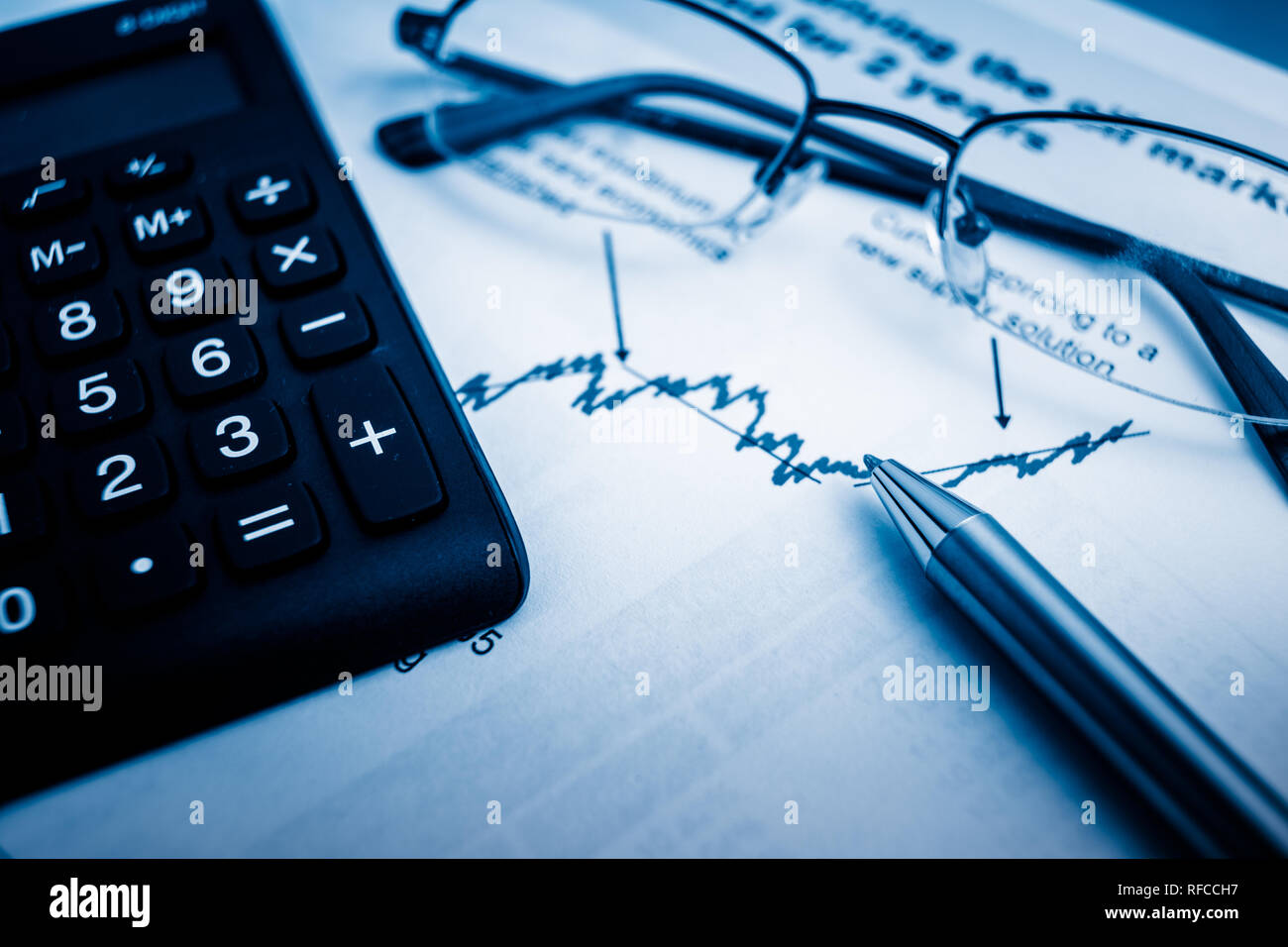 Business presentation with finance chart on the desk Stock Photo - Alamy
