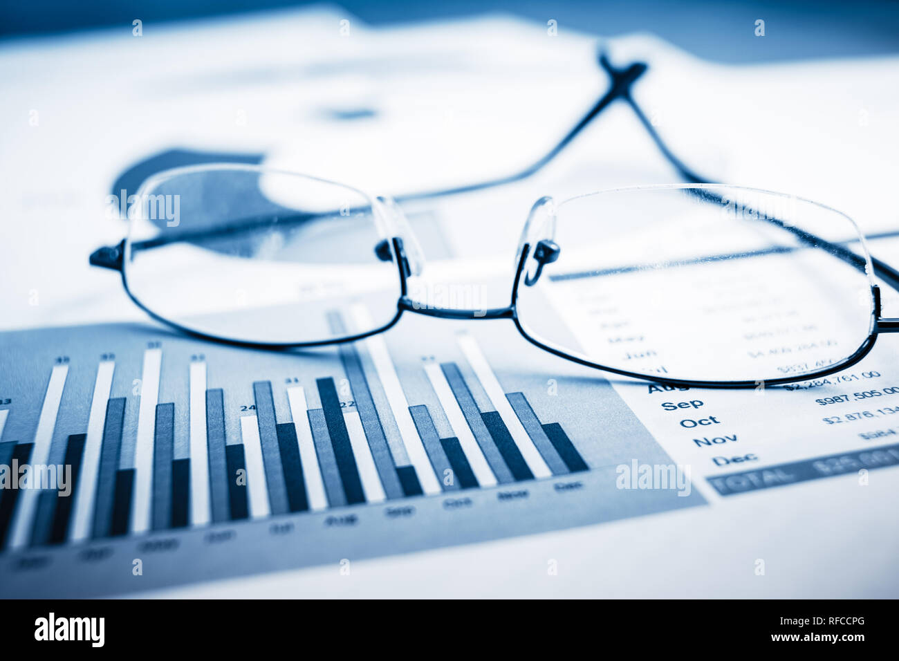 Business presentation with finance chart on the desk Stock Photo - Alamy