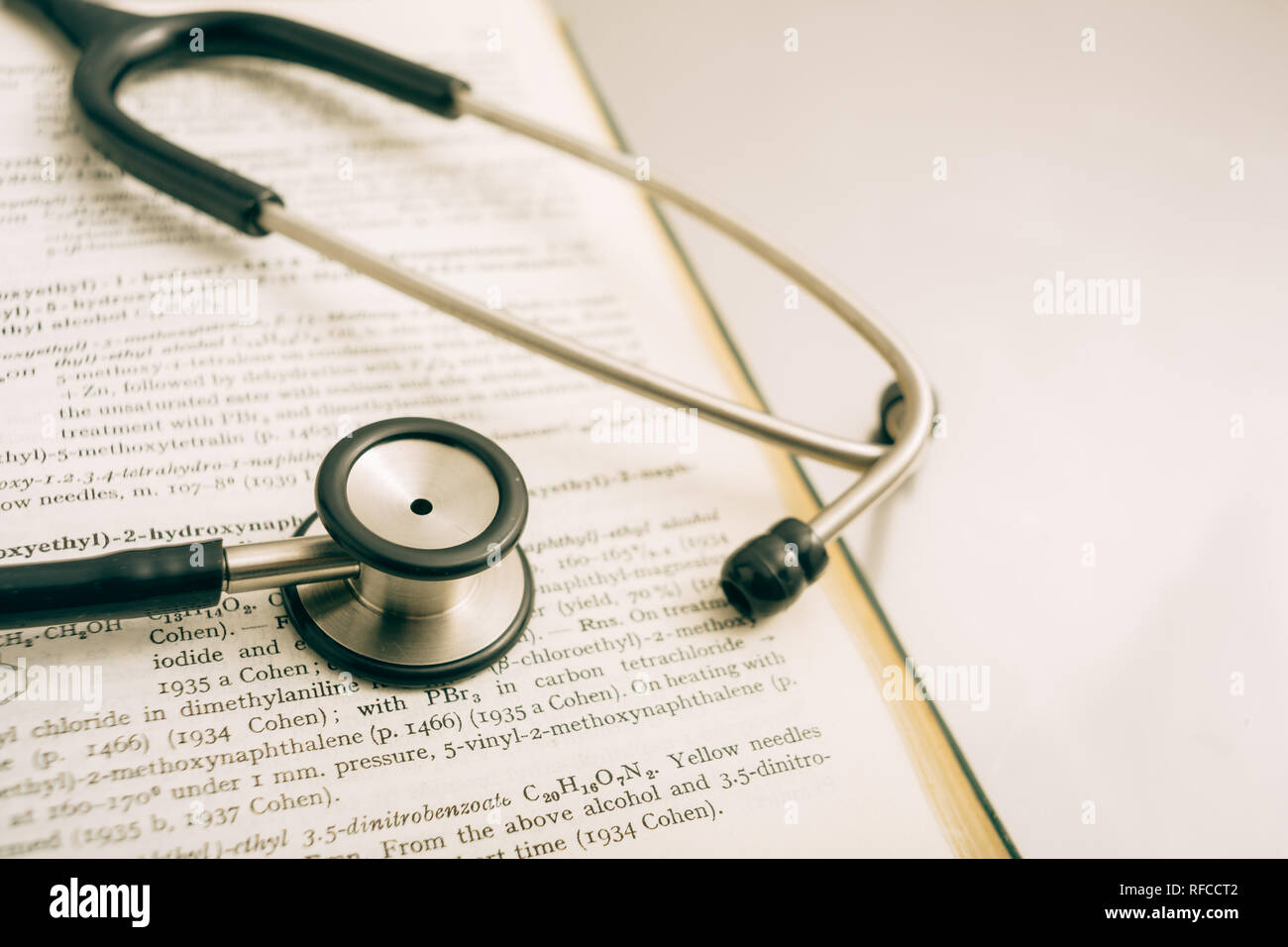 stethoscope and books on white background Stock Photo - Alamy