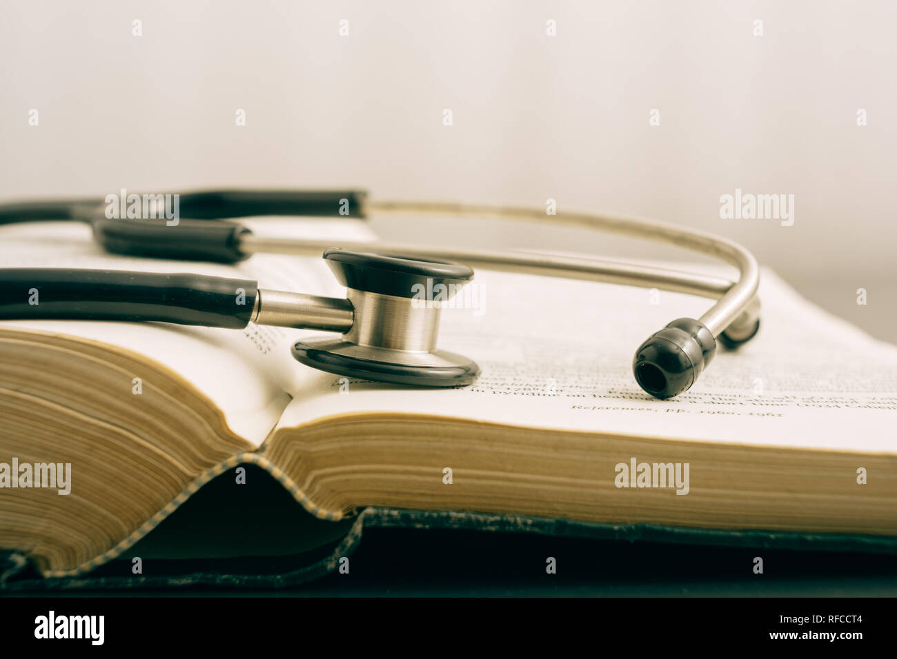 stethoscope and books on white background Stock Photo - Alamy