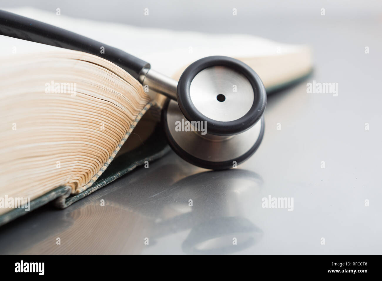 stethoscope and books on white background Stock Photo - Alamy