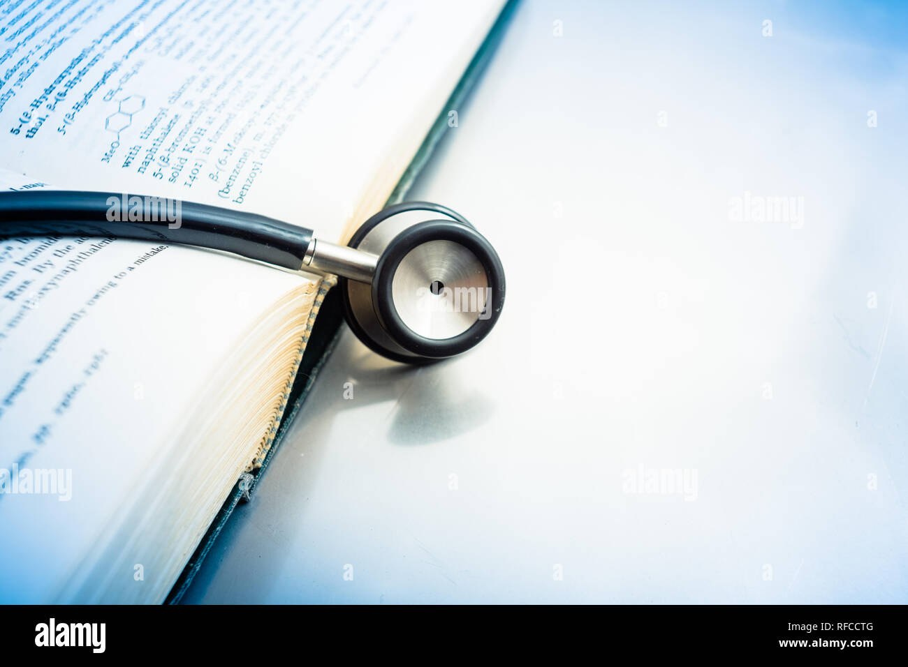 stethoscope and books on white background Stock Photo - Alamy