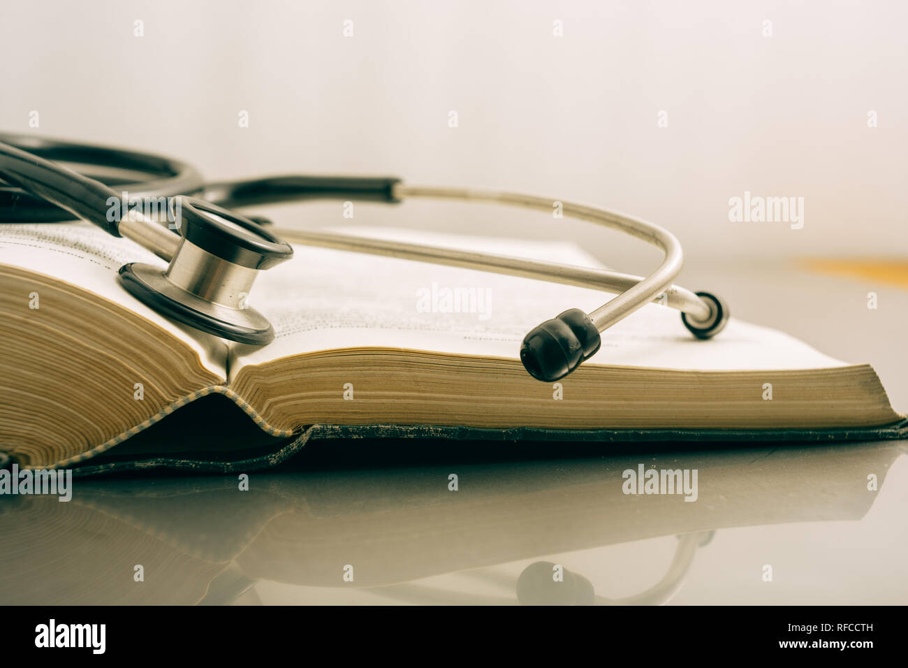 stethoscope and books on white background Stock Photo - Alamy