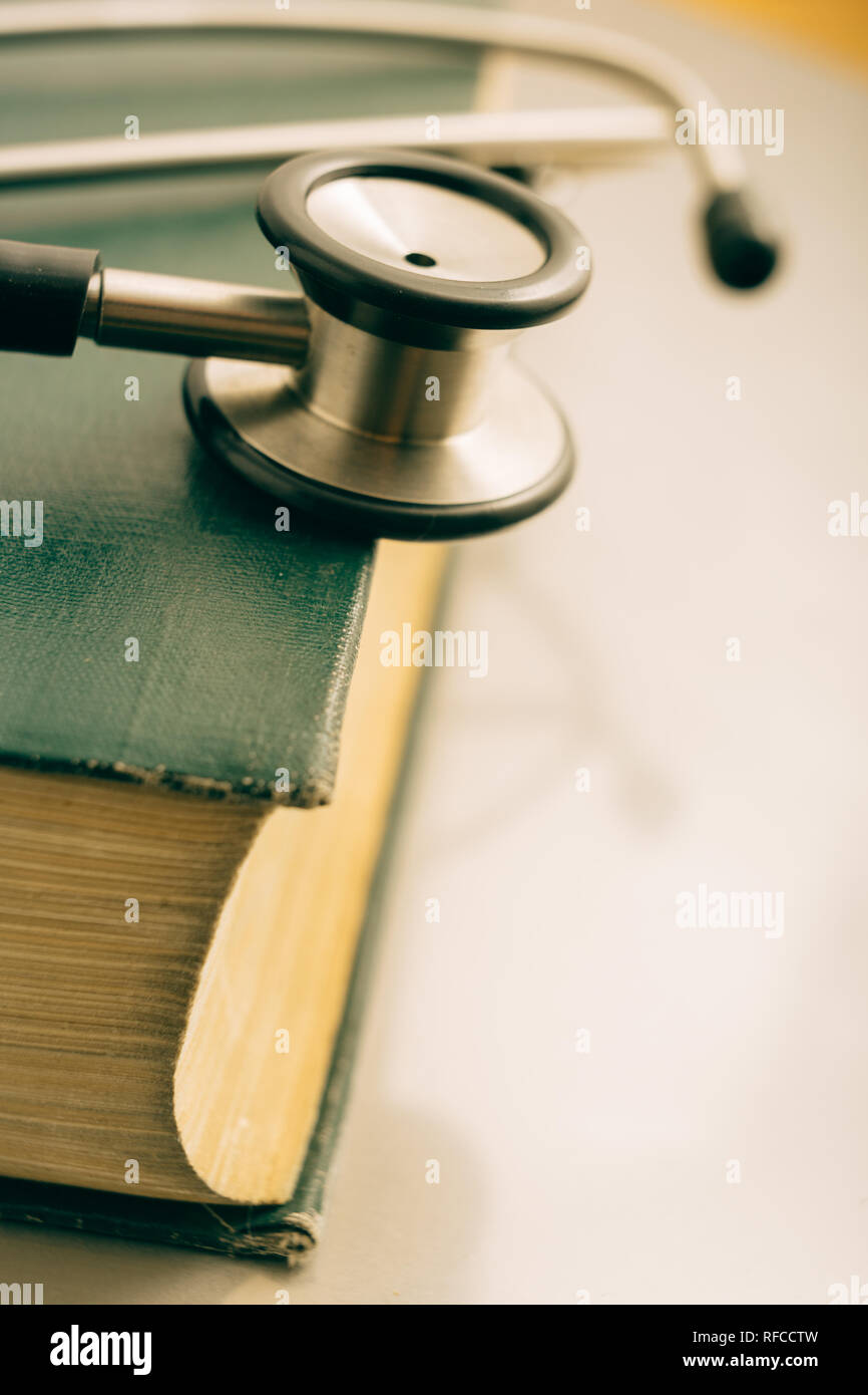 stethoscope and books on white background Stock Photo - Alamy